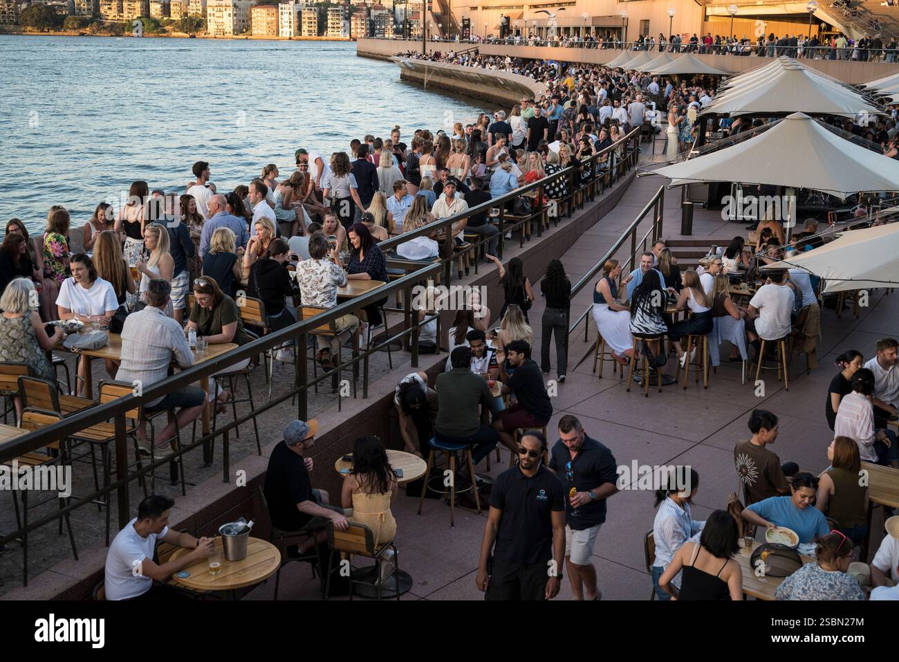Lots of people in the Opera bar outside Sydney Opera House, NSW ...