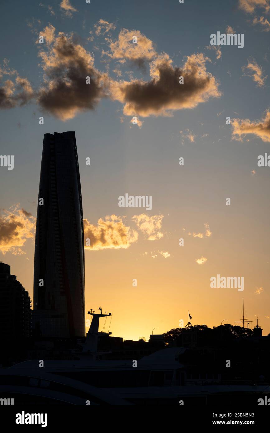 Silhouetted Crown Sydney tower, a skyscraper in Barangaroo, Sydney ...