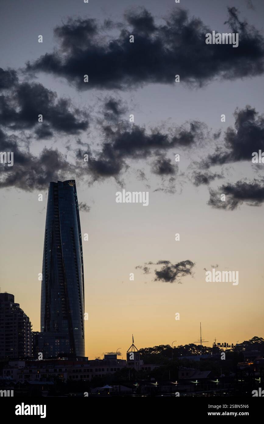 Silhouetted Crown Sydney tower, a skyscraper in Barangaroo, Sydney ...