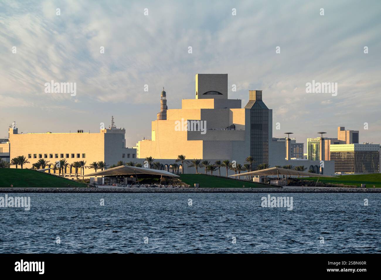 Seafront of Doha park and Museum of Islamic Art during sunset sunrise ...