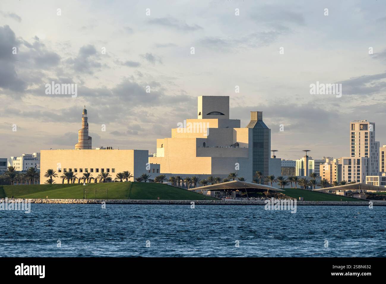 Seafront of Doha park and Museum of Islamic Art during sunset sunrise ...