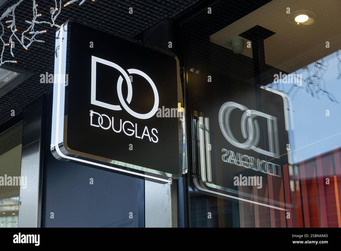Douglas shop, illuminated store logo. Douglas is the largest online ...