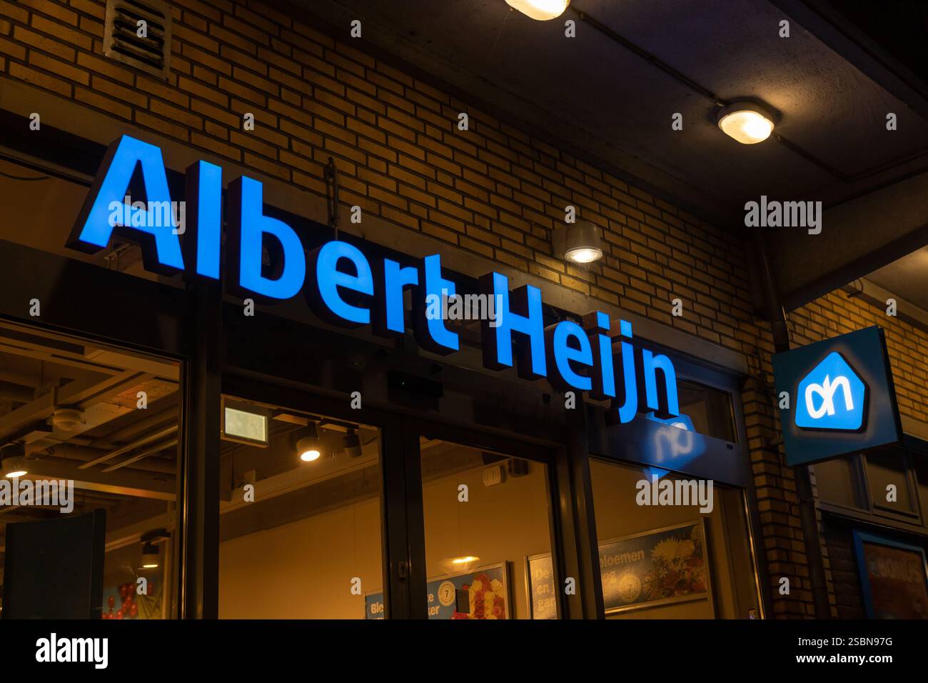 Albert Heijn logo shop sign supermarket store, the largest supermarket chain in the Netherlands ...