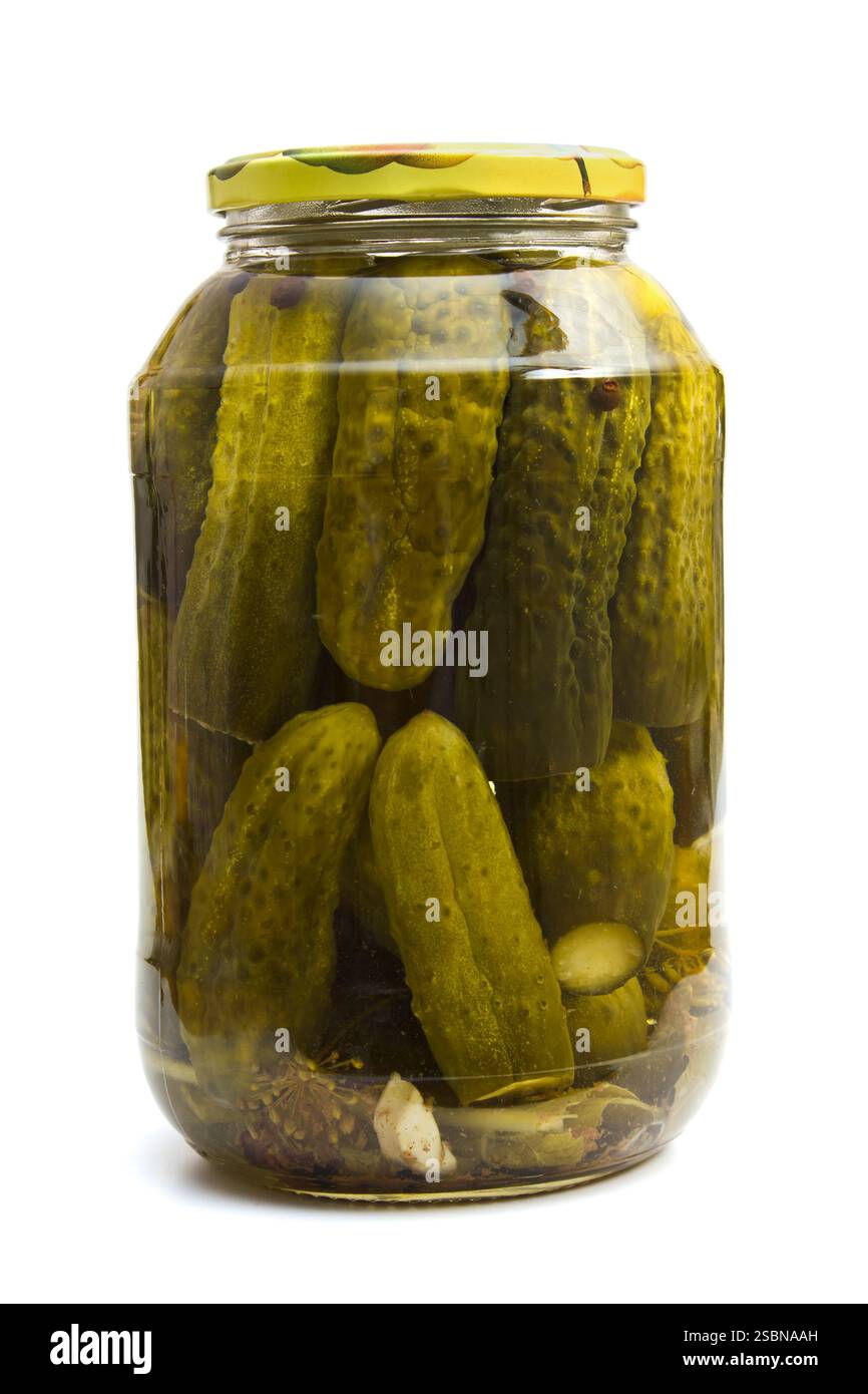 cucumbers preserved in a glass jar Stock Photo - Alamy