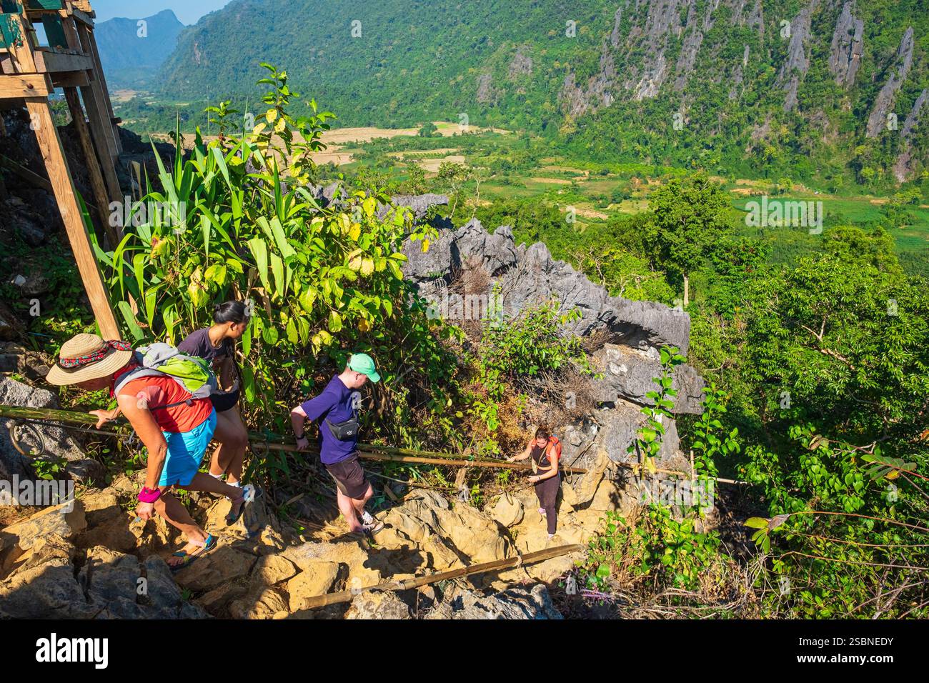 Laos, Vientiane province, Vang Vieng, climbing to Nam Xay viewpoint ...