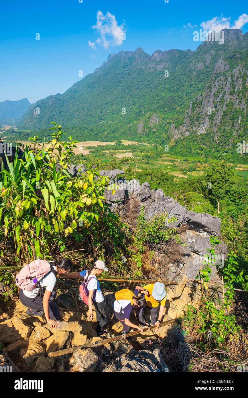 Laos, Vientiane province, Vang Vieng, climbing to Nam Xay viewpoint ...