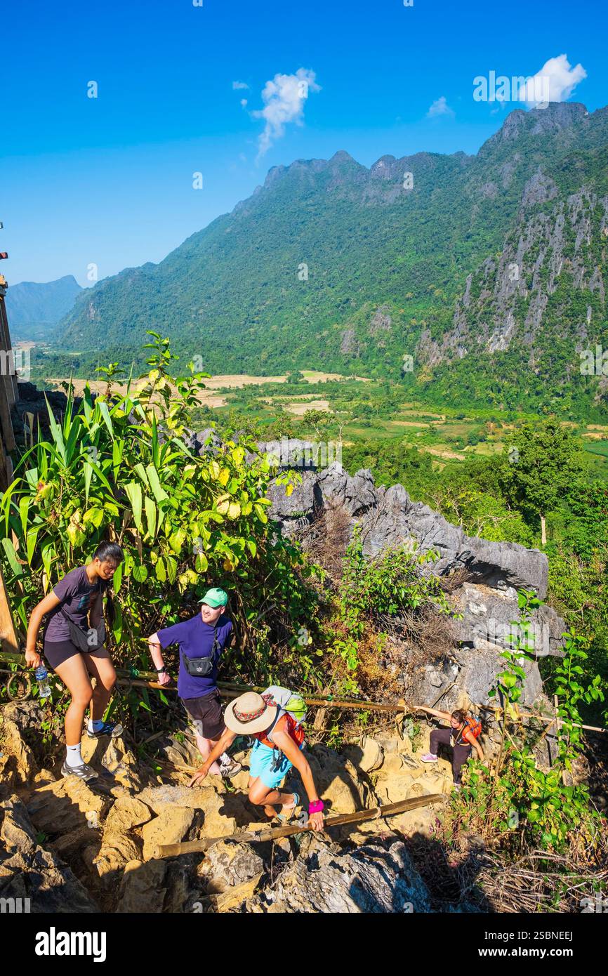 Laos, Vientiane province, Vang Vieng, climbing to Nam Xay viewpoint ...