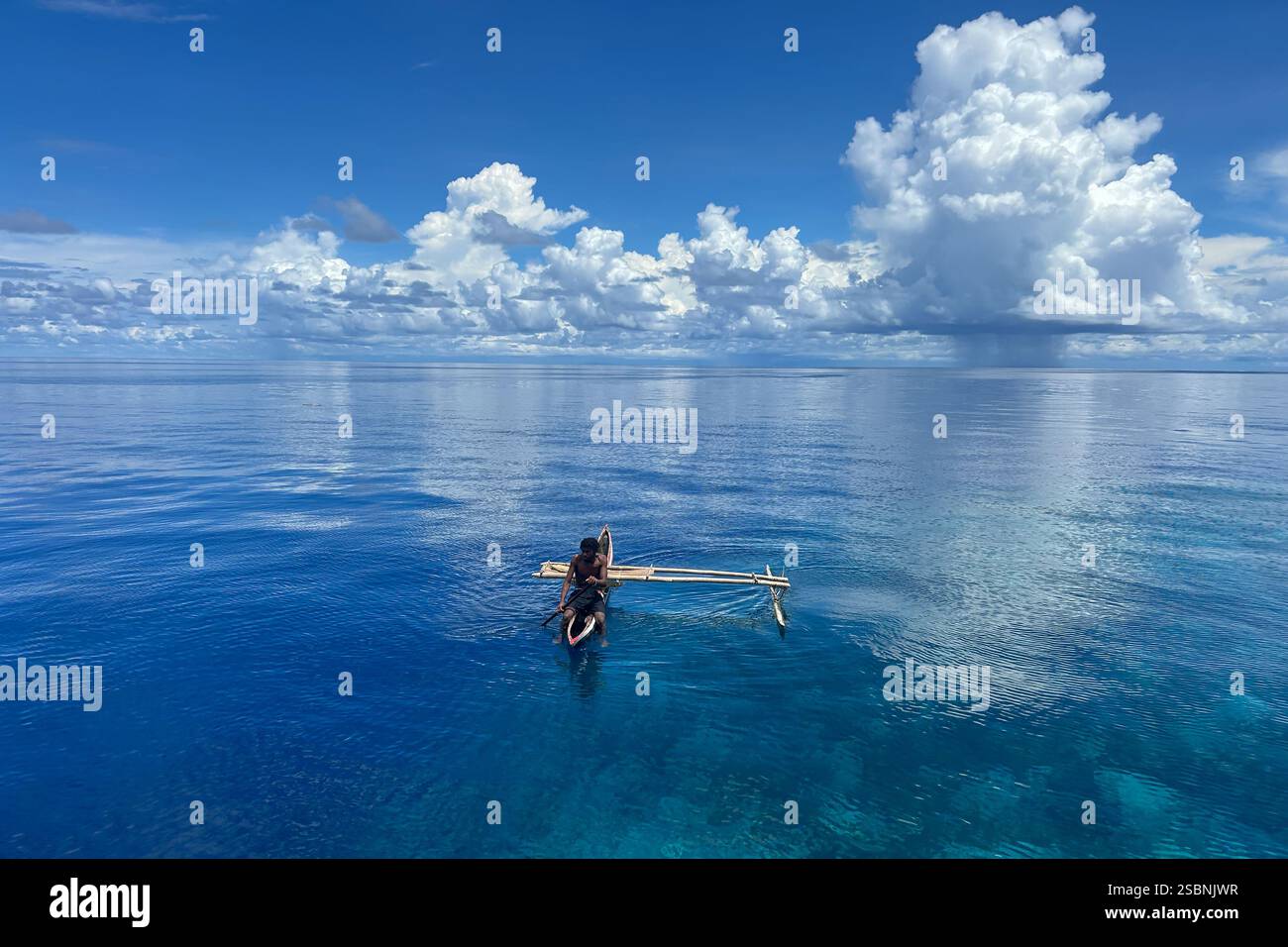 Residents of Vitu Islands in their traditional dugout canoes, Garove ...