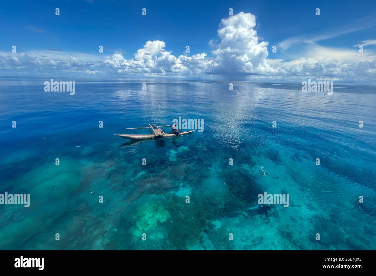 Residents of Vitu Islands in their traditional dugout canoes, Garove ...