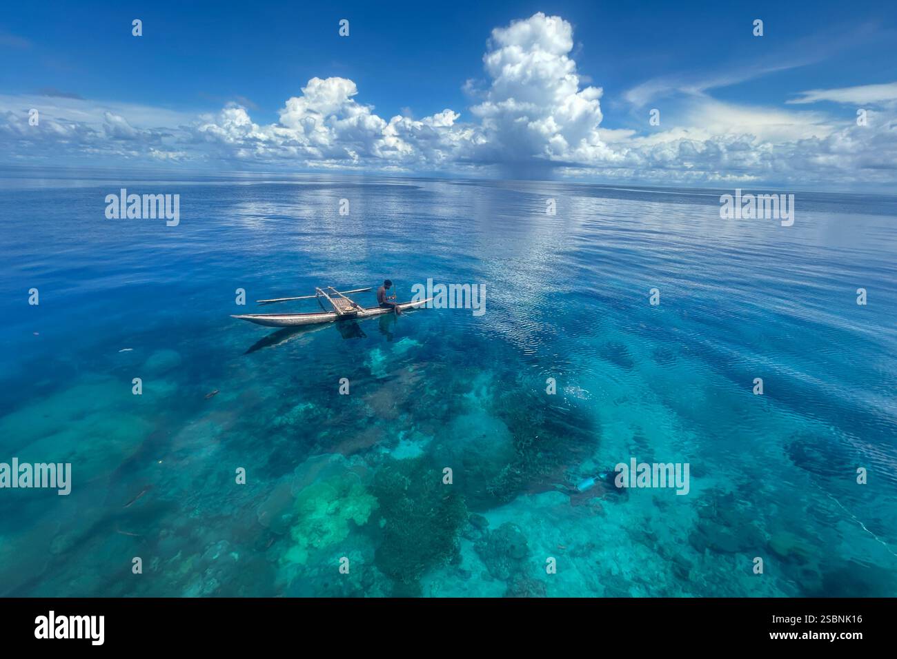 Residents of Vitu Islands in their traditional dugout canoes, Garove ...