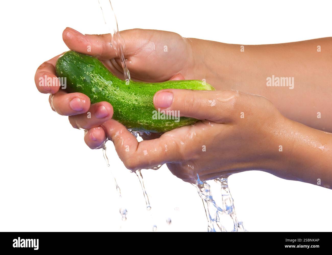 wash the cucumber in the hands isolated on white background Stock Photo ...