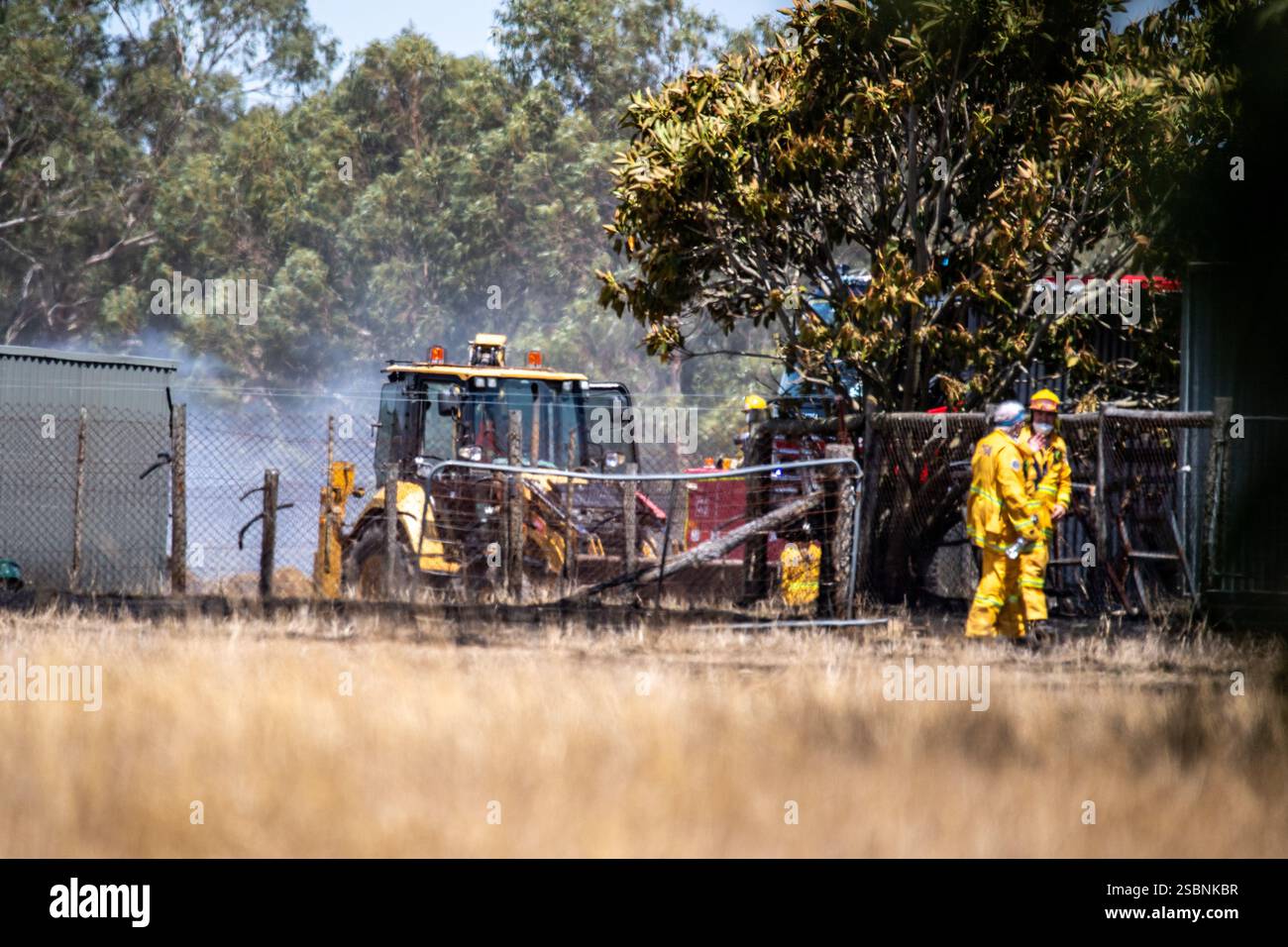 Country Fire Authority crews work quickly to contain a grass fire ...