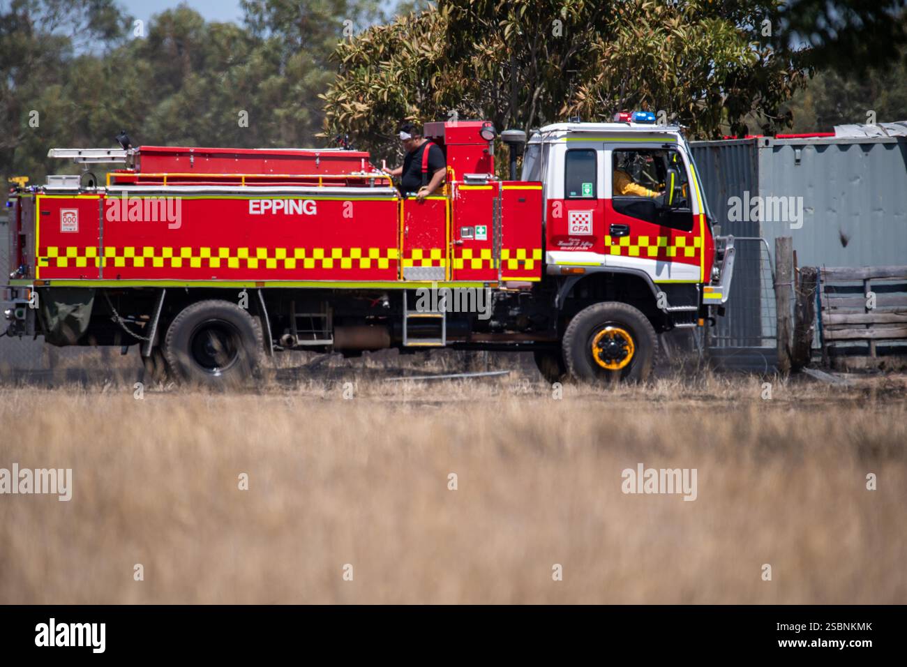 Country Fire Authority crews from Epping are some of the 27 trucks working quickly to contain a ...