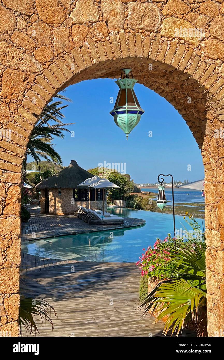 Morocco, Sidi Bennour province, Oualidia, stone entrance wall showing the Sultana luxury hotel ...