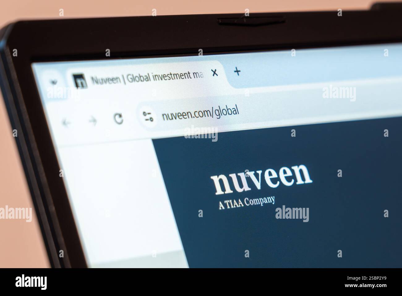 New York, USA - January 31, 2025: Nuveen website homepage on laptop screen showcasing global ...