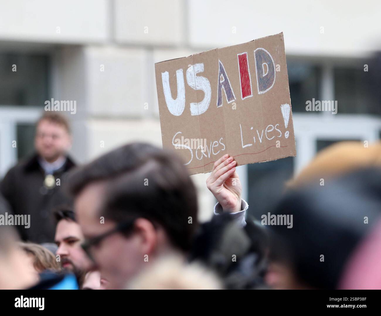 Employees and supporters gather to protest outside of the U.S. Agency ...