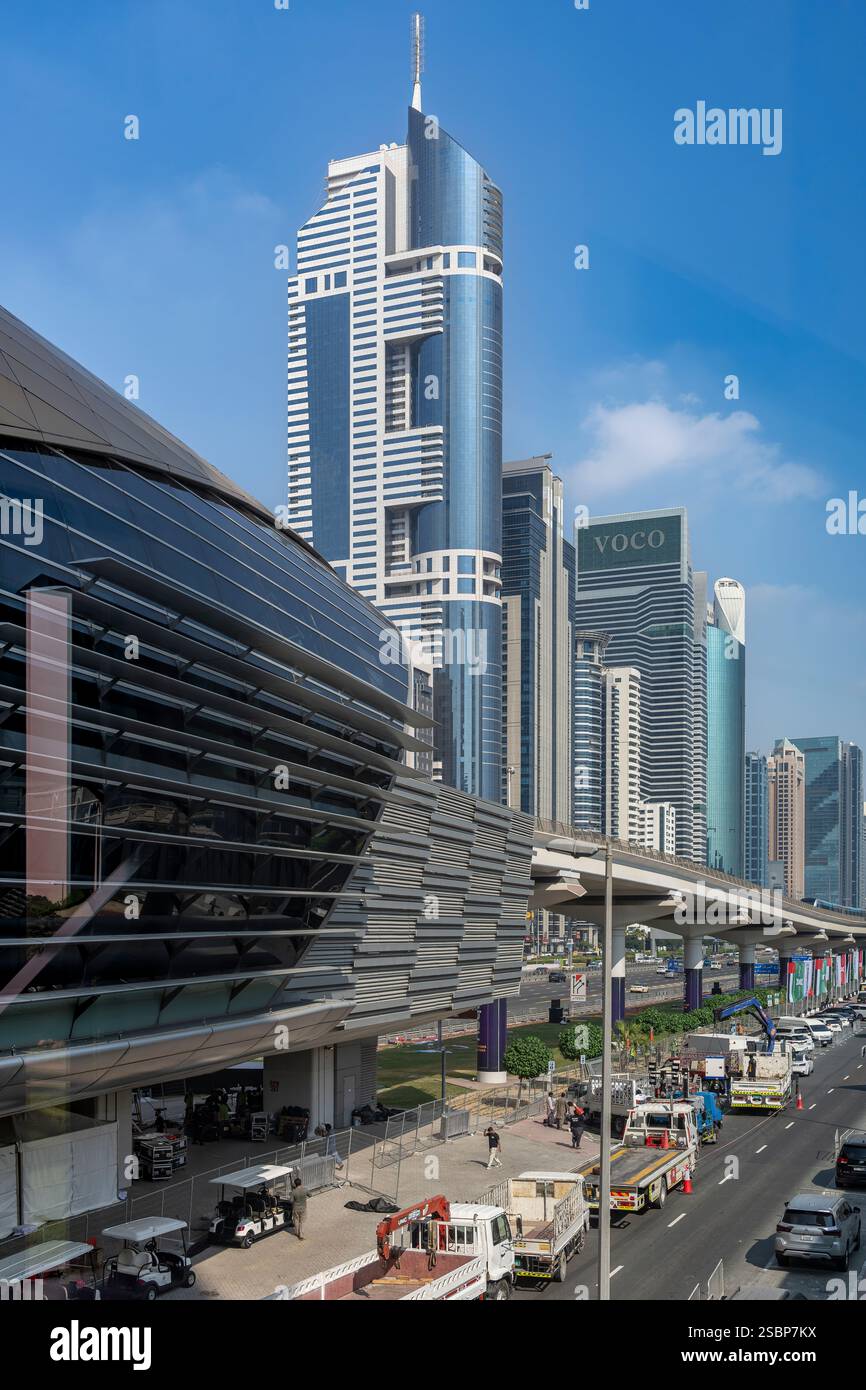 Futuristic Dubai's Emirates Towers metro station. With dramatic ...