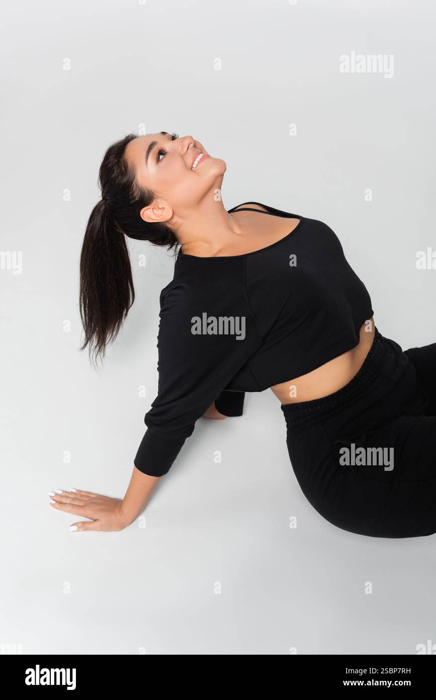 Strong and fit woman radiates confidence while engaging in her fitness ...