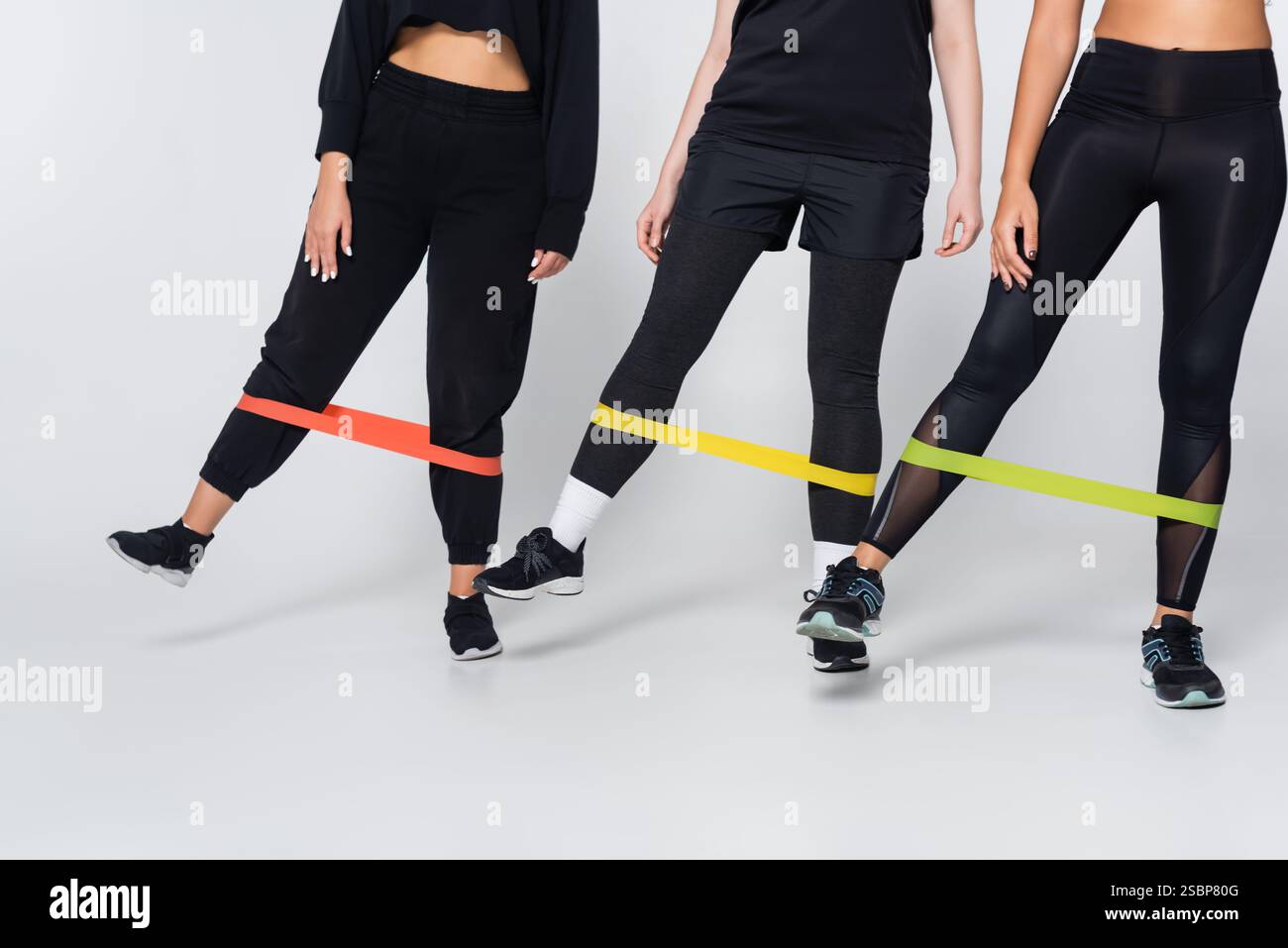 Three strong women showcase their fitness strength while using ...