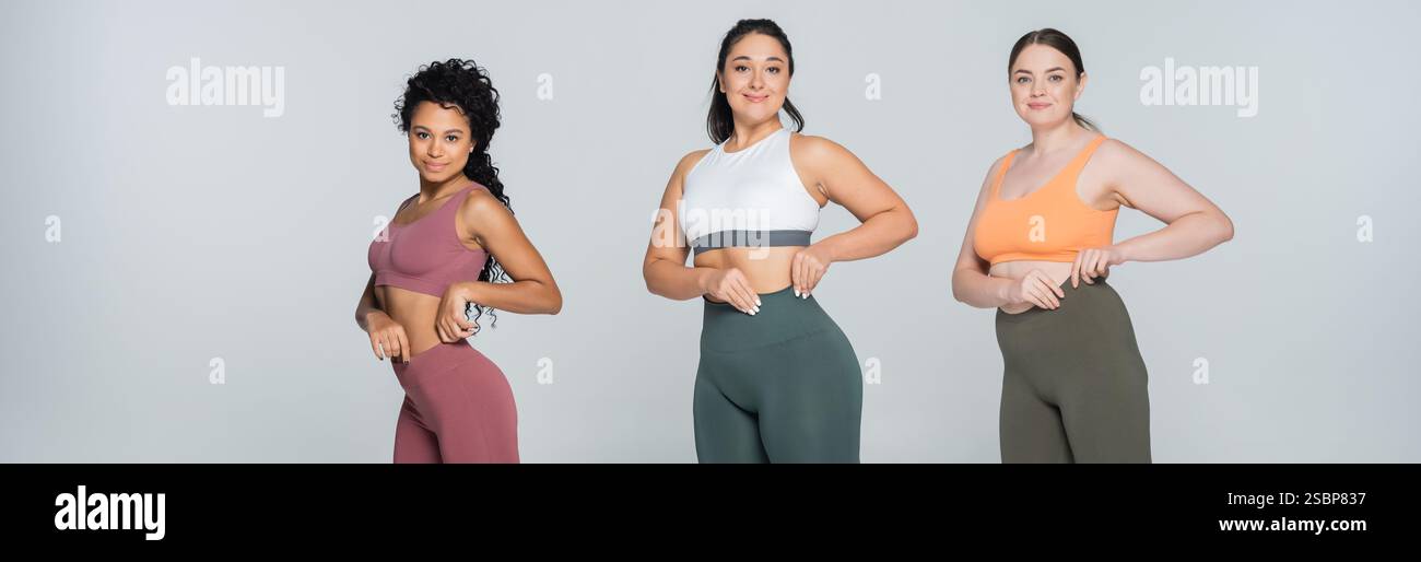 Three fit women exude confidence while demonstrating their fitness ...