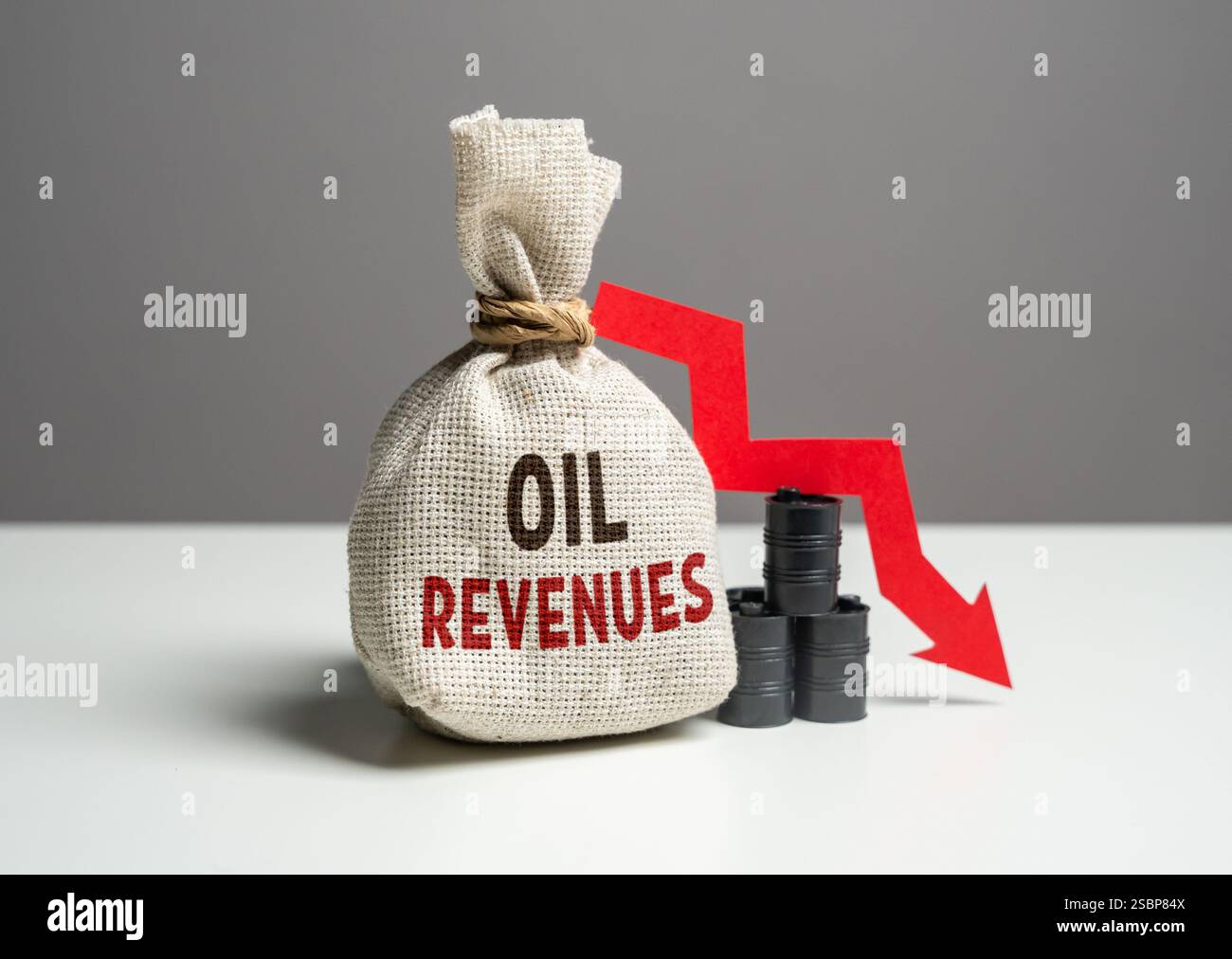 Money bag down arrows hi-res stock photography and images - Alamy