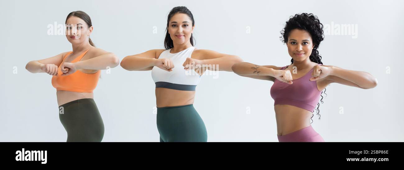 Three strong and fit women display determination while engaging in a ...