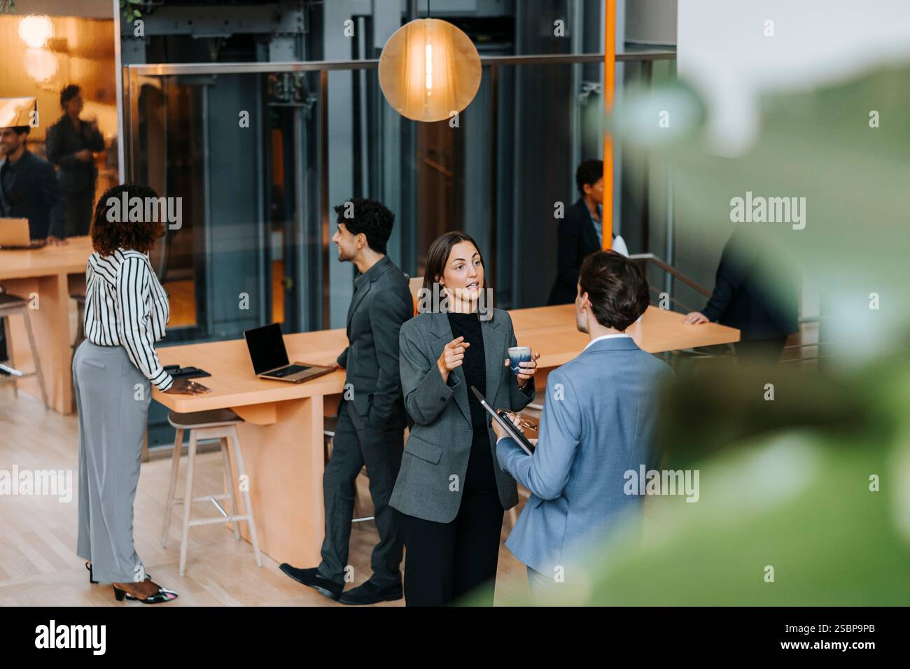 Female delegate explaining business hi-res stock photography and images ...