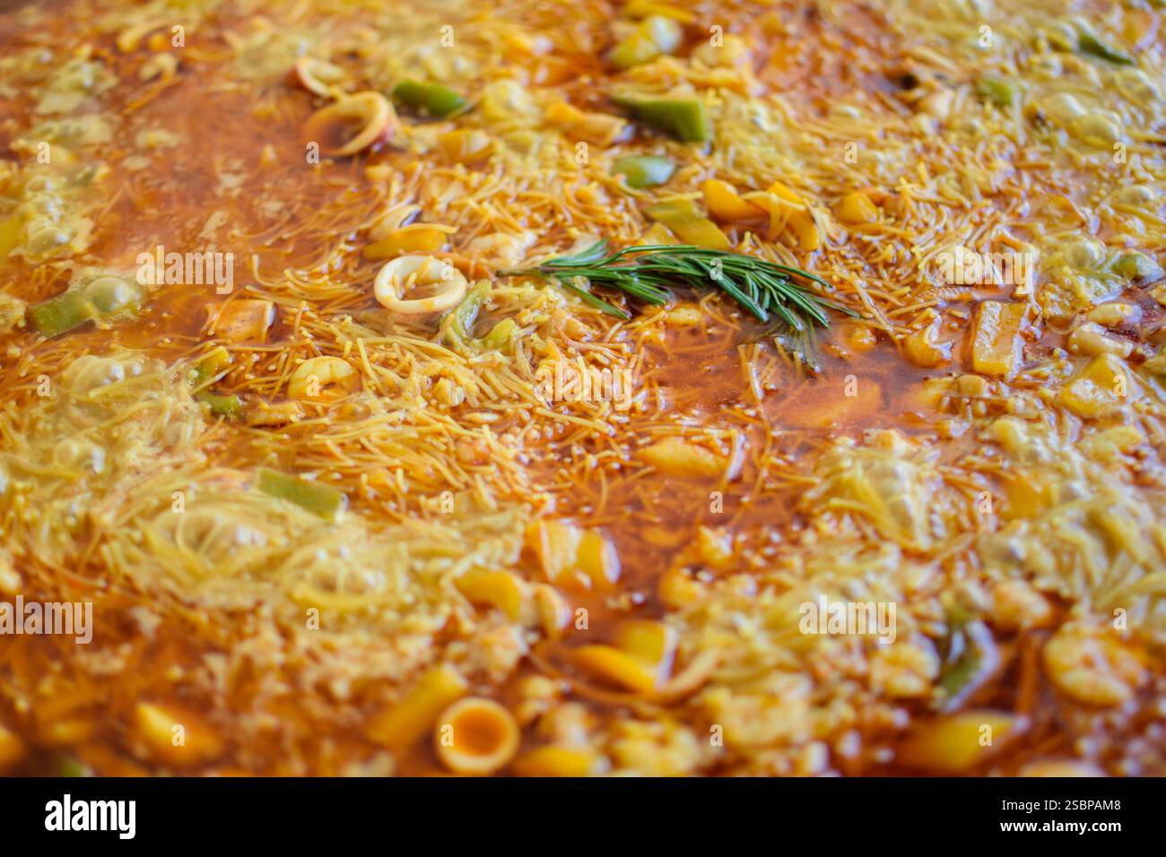 Traditional Fideua from Spain, a typical pasta made with similar paella ...