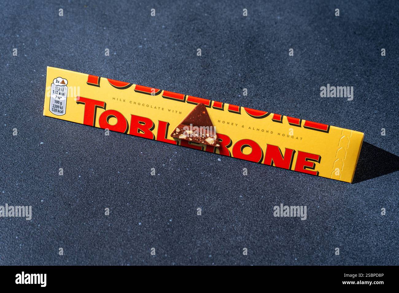 Toblerone brand chocolate yellow packaging. Swiss Mondelez candy bar ...
