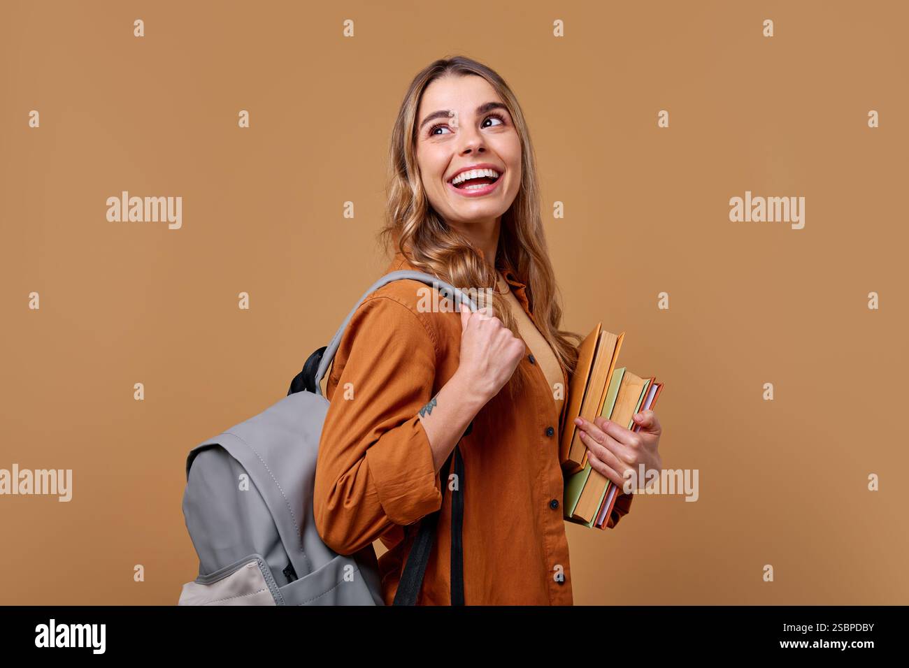 Joyful student confidently holding hi-res stock photography and images ...
