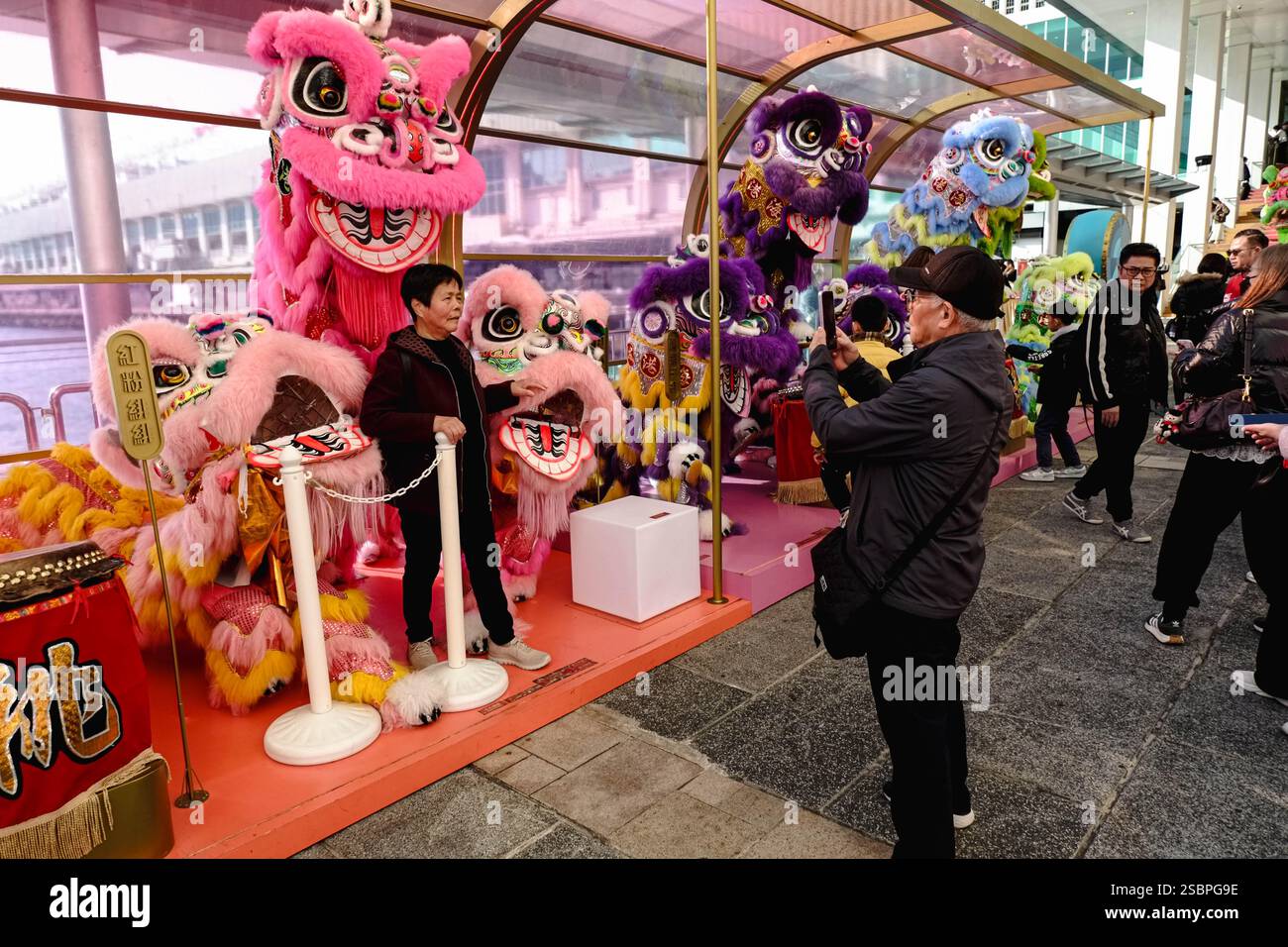 Hong Kong, China. 4th Feb, 2025. Tourist pose for photos in front of ...
