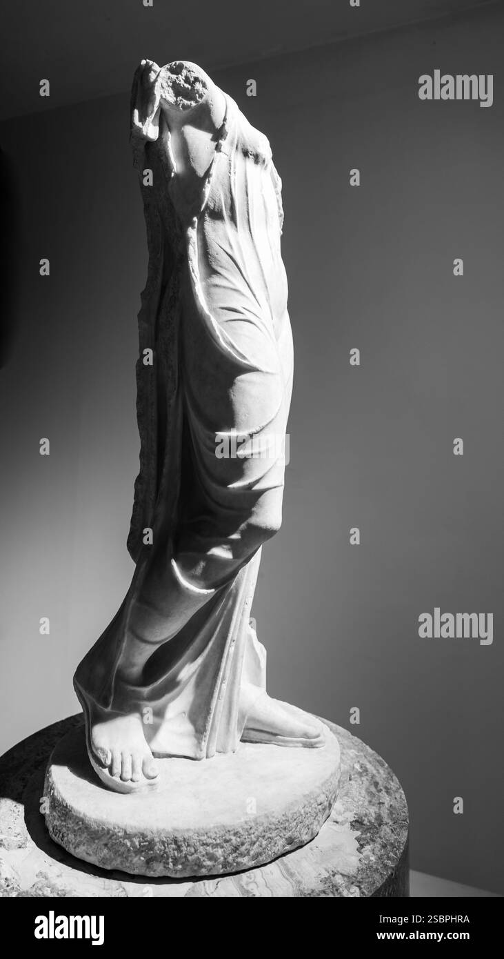 Black and white photo showing ruins of ancient marble statue ...