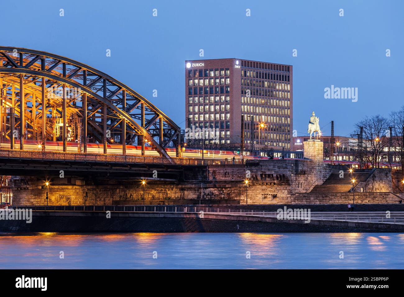 Hohenzollern railway bridge and the Zurich Insurance high-rise in the ...