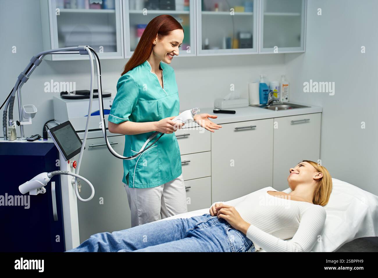 A professional dermatologist demonstrates a skincare procedure to a ...