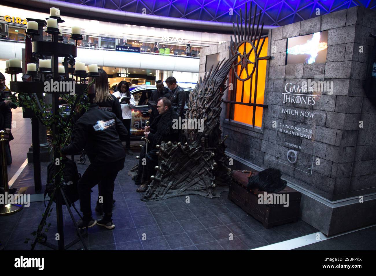 Fans sit on the Iron Throne to pose for Sky Atlantic's Release of the ...