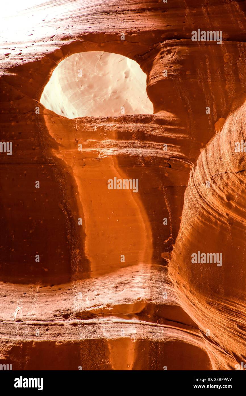 A large rock formation with a hole in the middle. The hole is ...