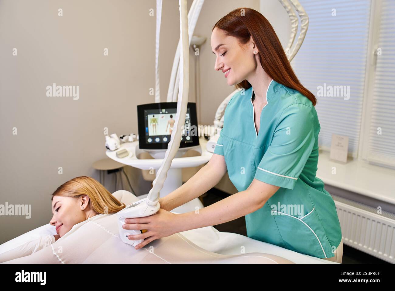 A young woman receives a skin procedure from her dermatologist in a ...