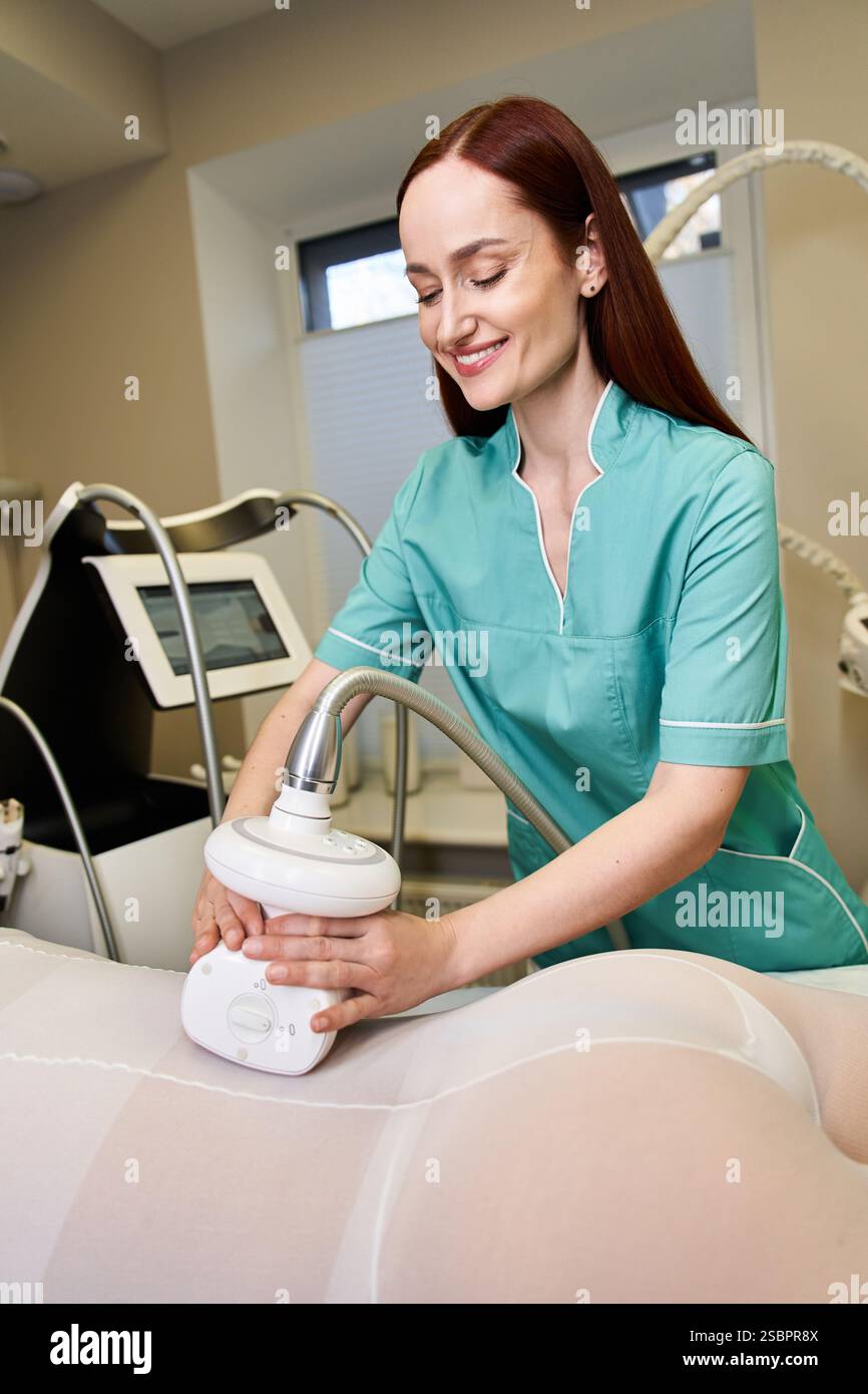 A young, beautiful dermatologist performs a skin treatment procedure in ...