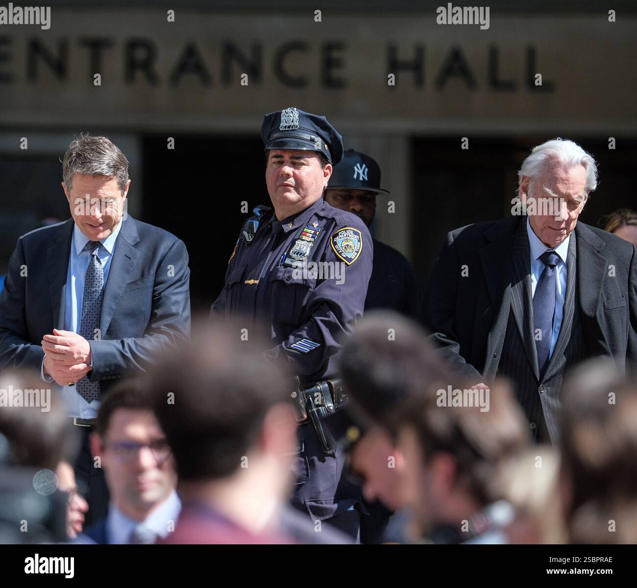 Actors Hugh Grant (L) and Donald Sutherland on the set of the new TV ...