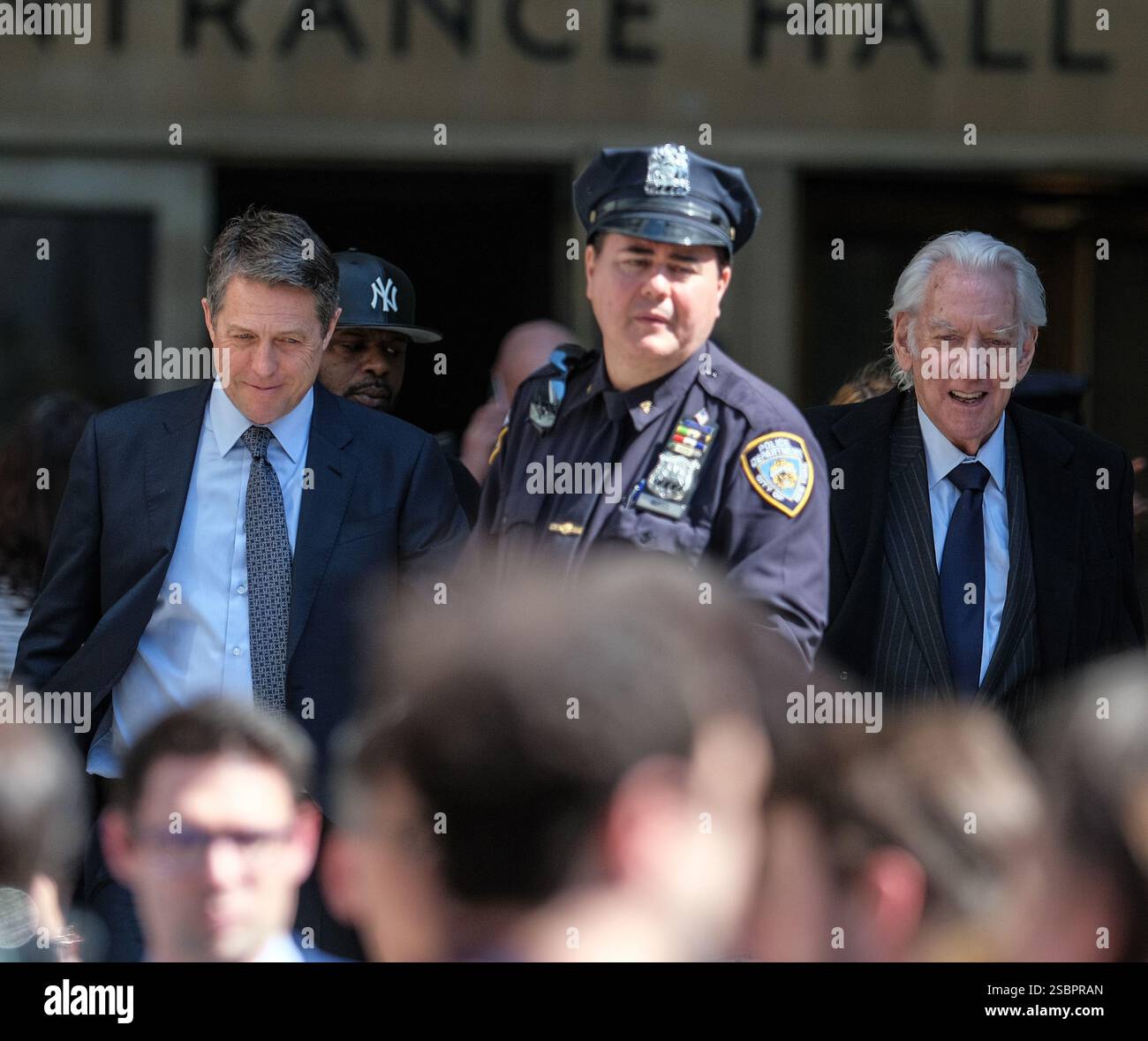 Actors Hugh Grant (L) and Donald Sutherland on the set of the new TV ...
