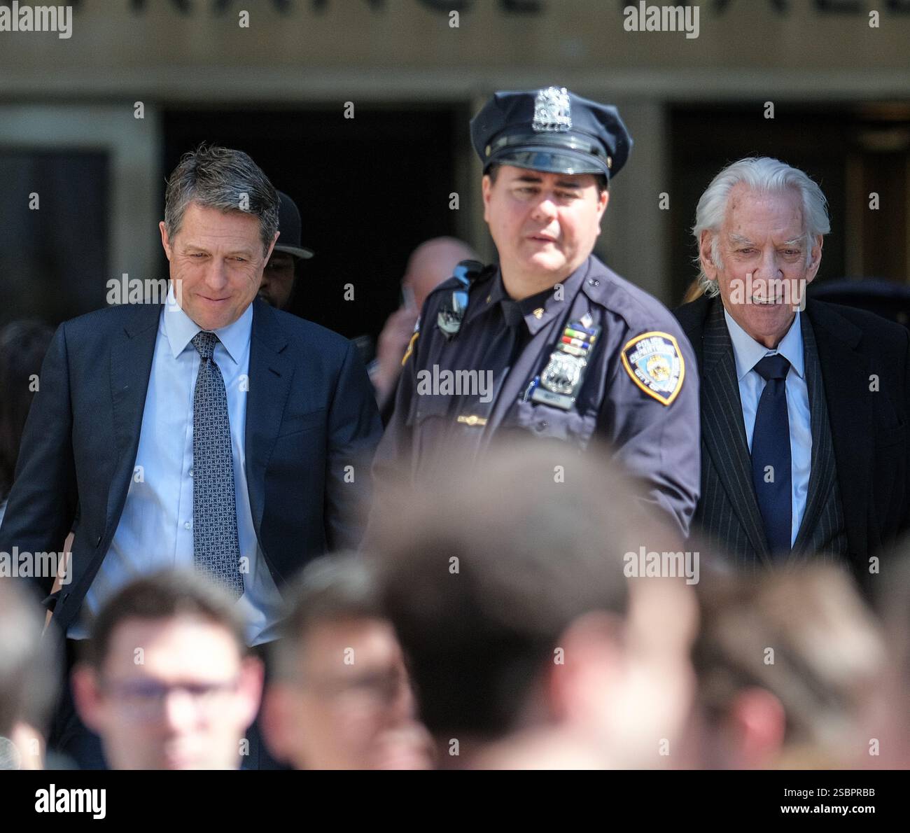 Actors Hugh Grant (L) and Donald Sutherland on the set of the new TV ...