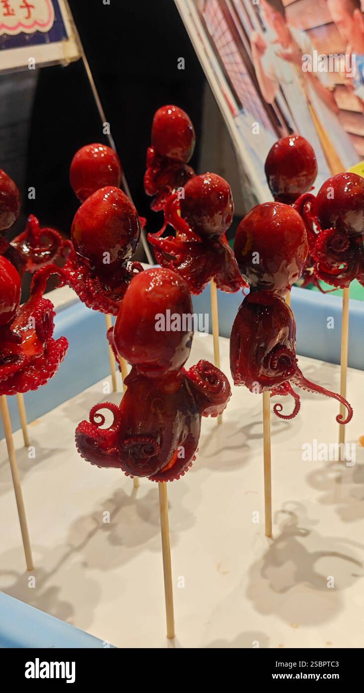 Japanese octopus skewers Stock Photo - Alamy