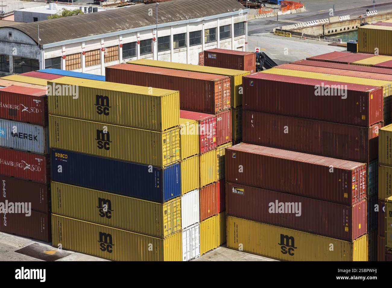 Stacked rectangular metal box shipping containers and warehouse ...