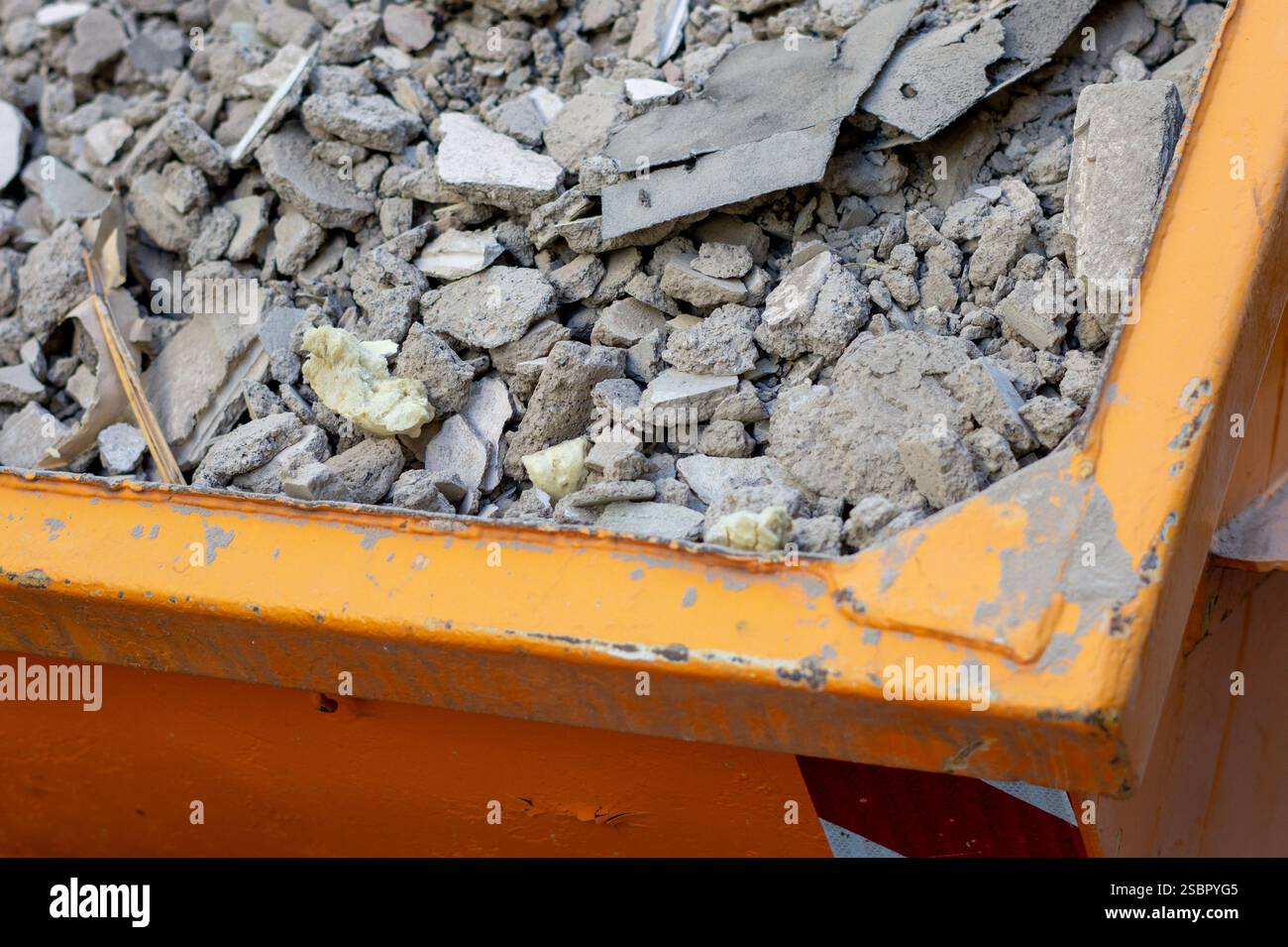 Containers with concrete building rubble on a construction site for ...