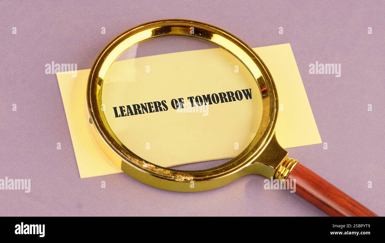 A magnifying glass highlights the phrase learners of tomorrow ...