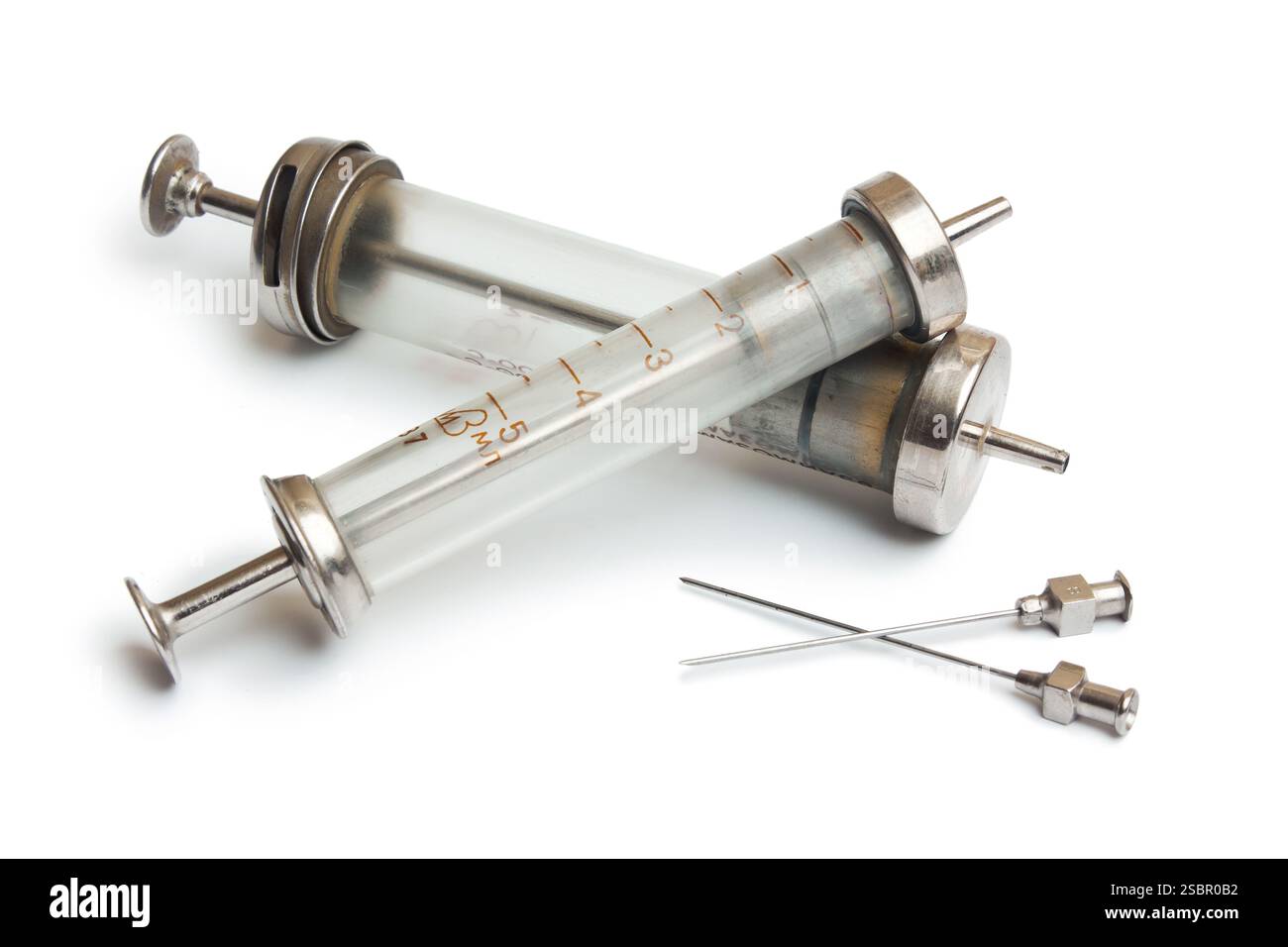 syringes old model on a white background Stock Photo - Alamy