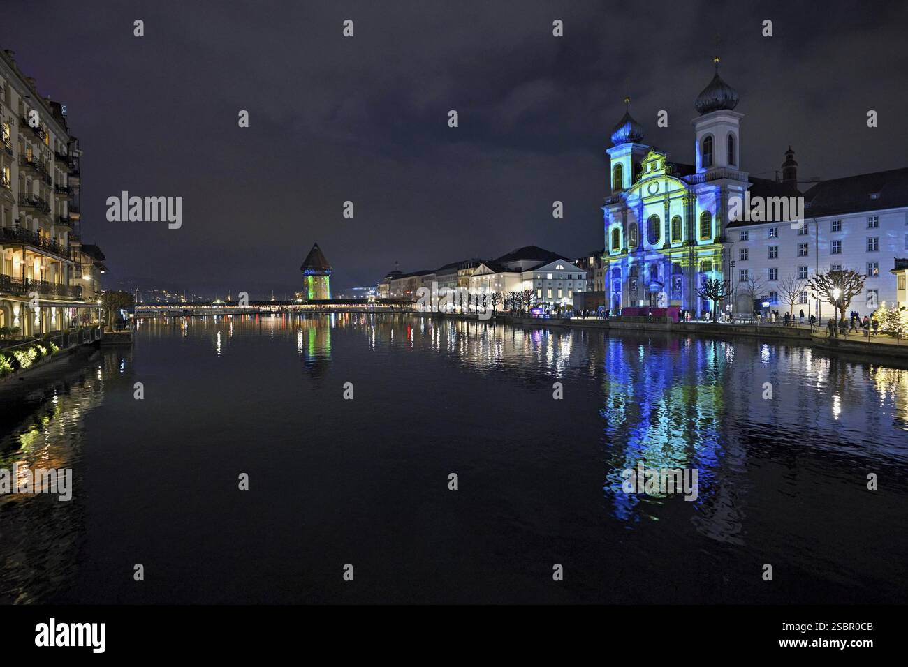 Water tower and Jesuit church on the right with light installation, on ...