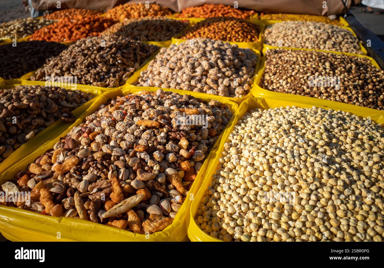 Various types of fried peanuts at a food shop in Medina city, Saudi ...
