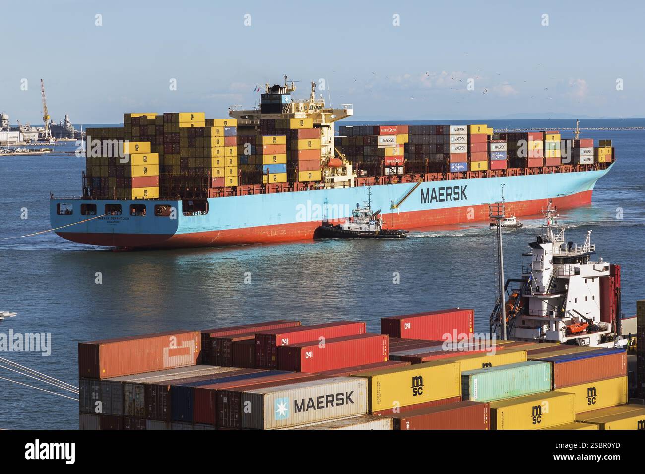 Maersk Serangoon cargo ship loaded with metal box shipping containers ...