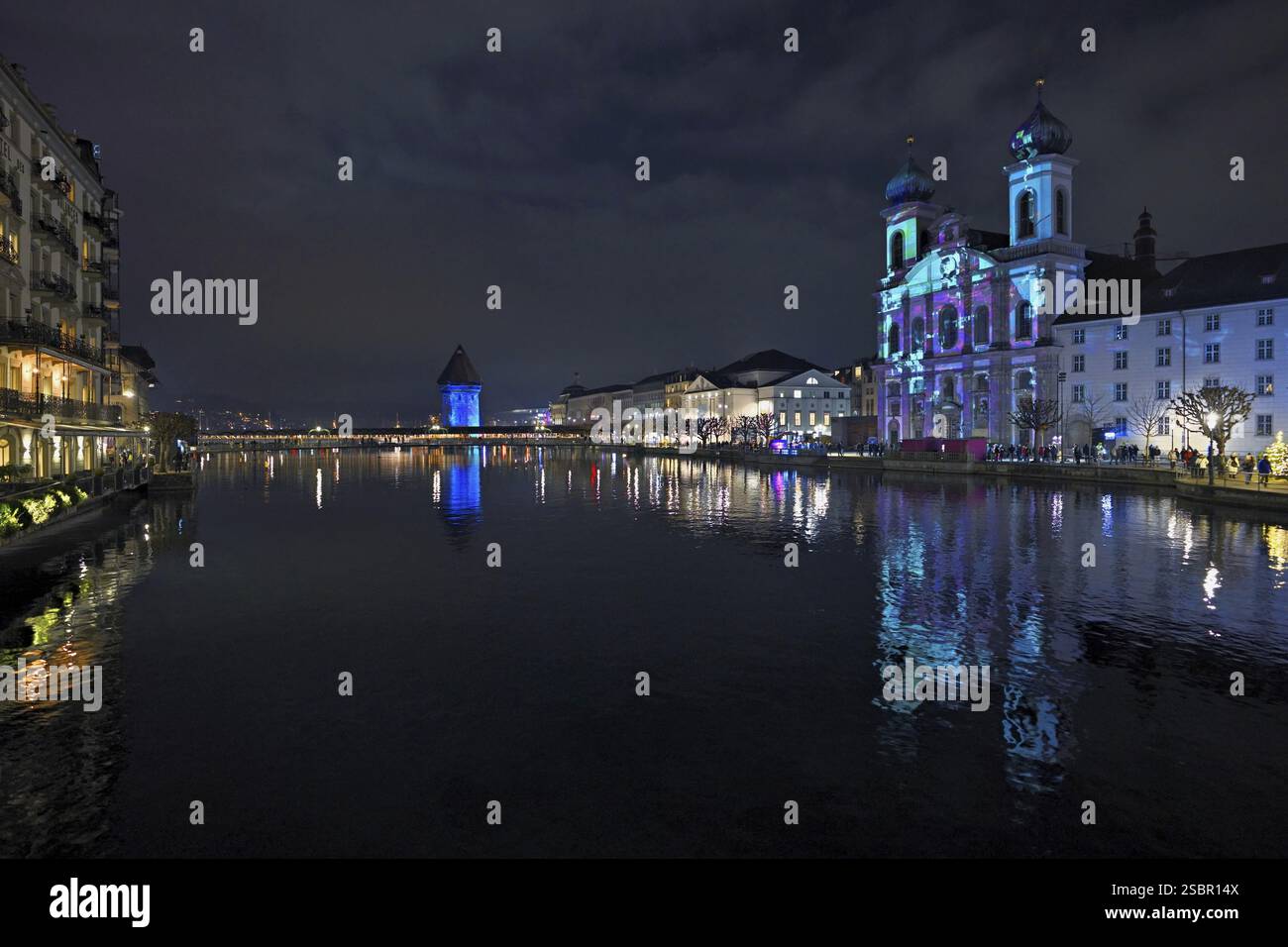 Water tower and Jesuit church on the right with light installation, on ...